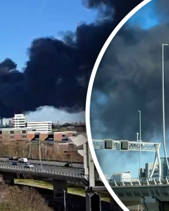 Enorme zwarte wolken: grote brand bij scooterbedrijf Amsterdam | De ...